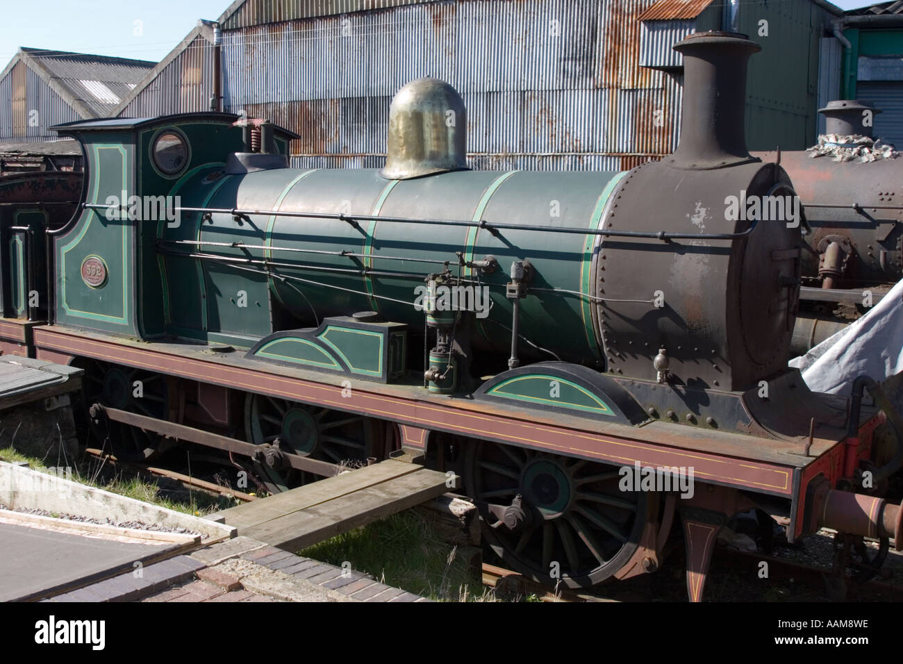 Rusty steam locomotives awaiting restoration in a station yard Stock ...