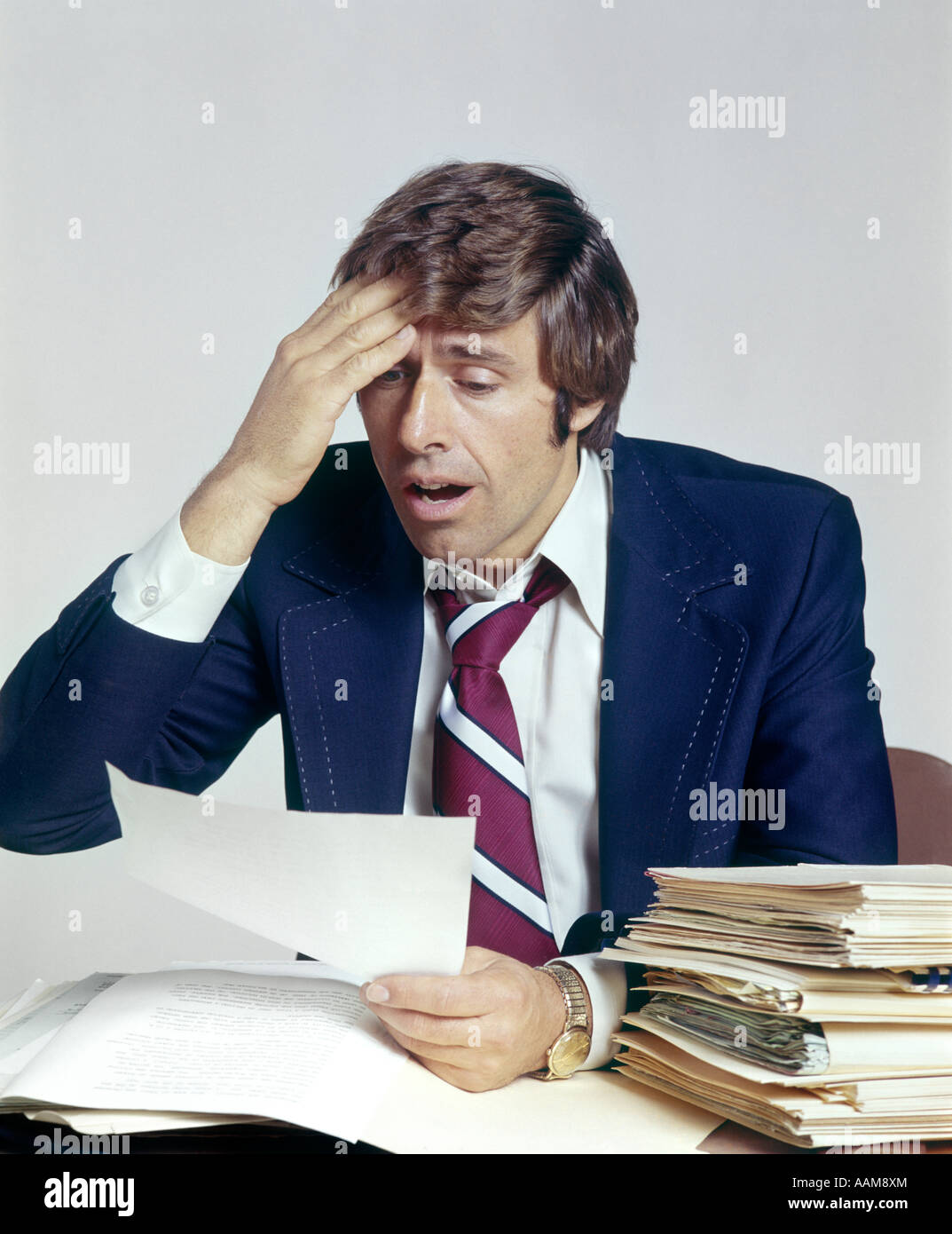 MAN OFFICE BUSINESS PAPERWORK HEADACHE OVERWHELMED OVERWHELMING WORK ...