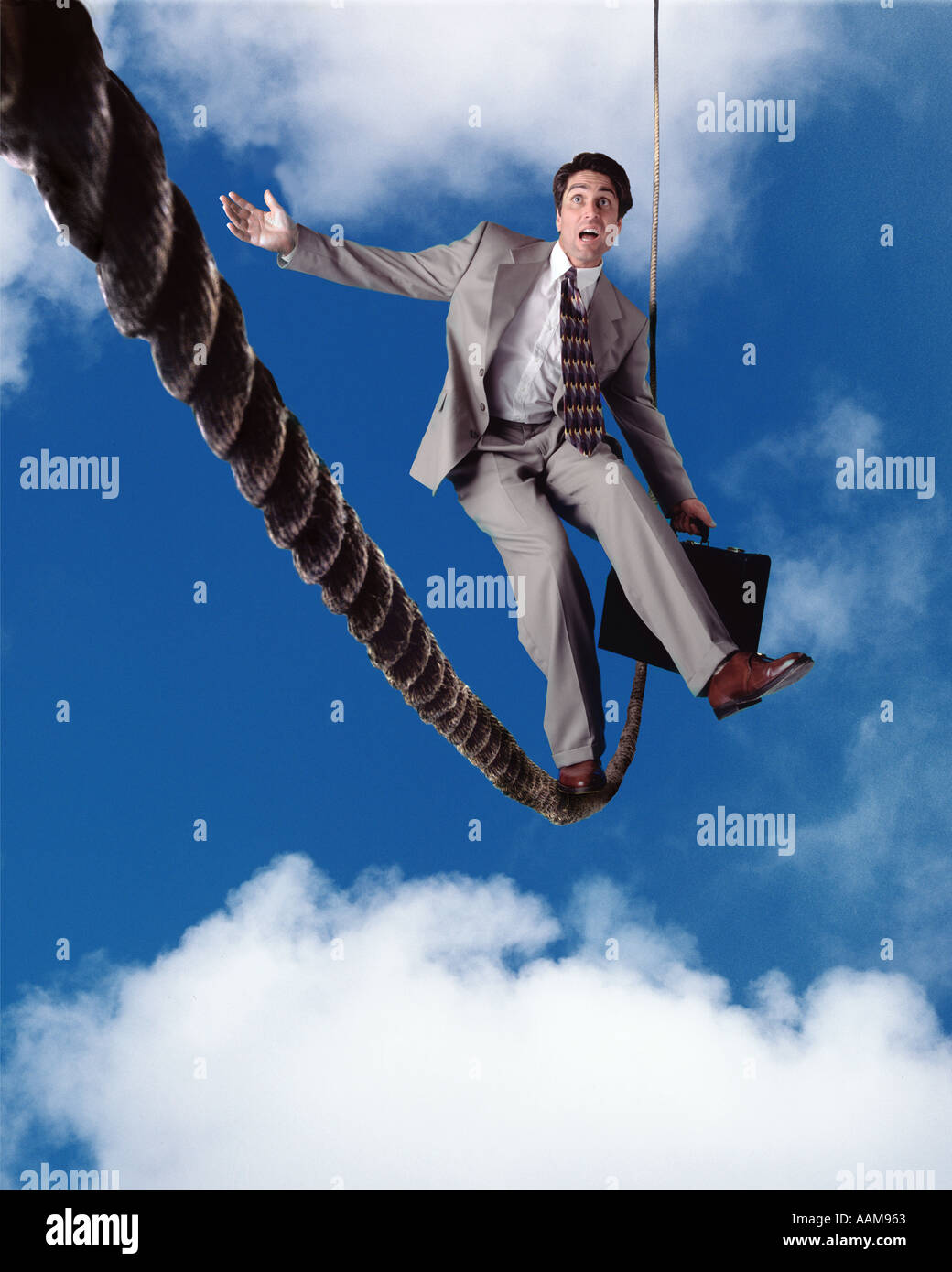 Walking a tightrope hi-res stock photography and images - Alamy