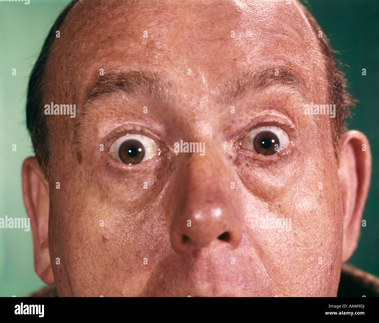 1960s CLOSE UP DETAIL OF FLORID MAN FACE WITH EYES OPEN WIDE AND ...