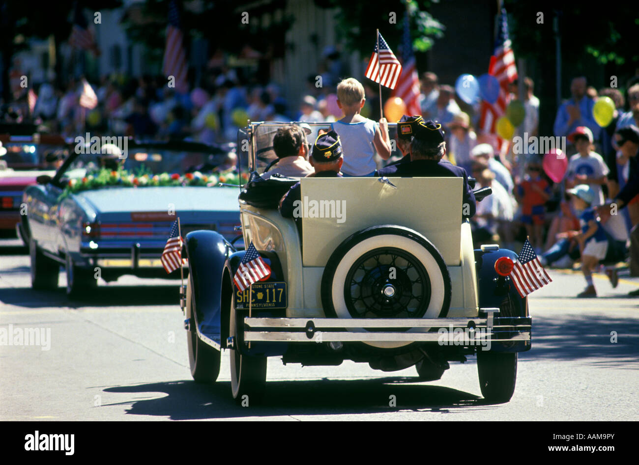 Children american flag parade marching hi-res stock photography and ...