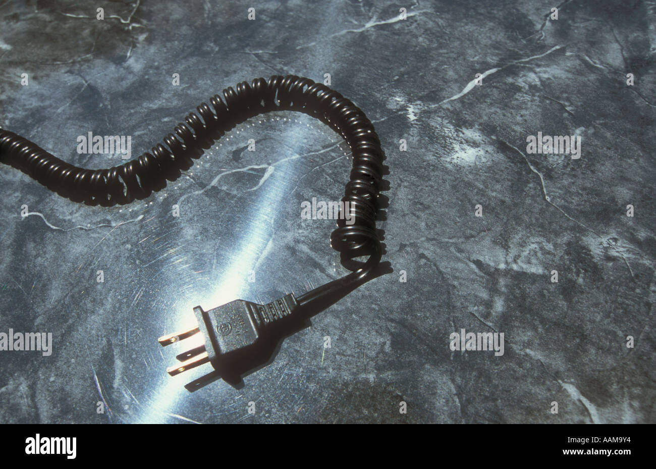 Coiled electrical cord for applaince on counter top Stock Photo - Alamy