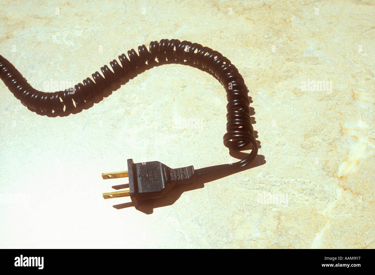 Coiled electrical cord for applaince on counter top Stock Photo - Alamy