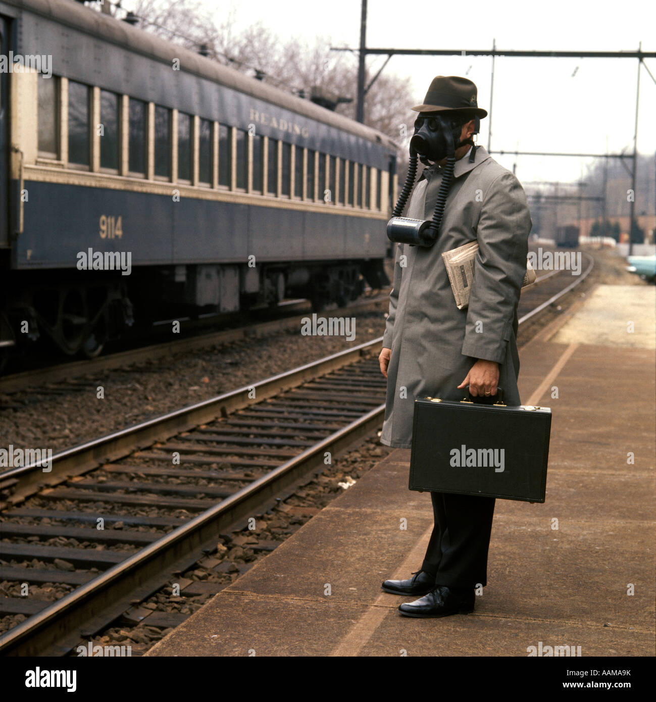 1970 1970s BUSINESSMAN MAN BRIEFCASE TRAIN STATION RAILROAD PLATFORM ...