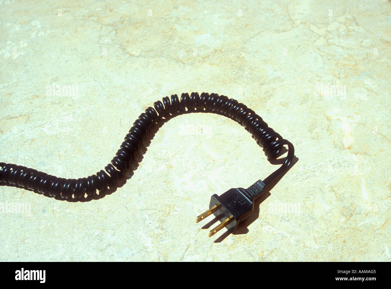 Coiled electrical cord for applaince on counter top Stock Photo - Alamy