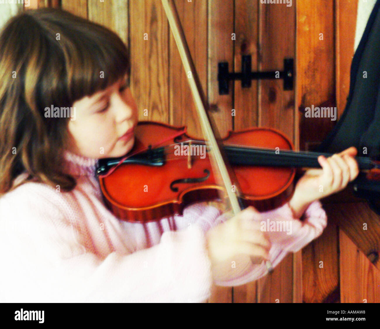 Child violin teach hi-res stock photography and images - Alamy