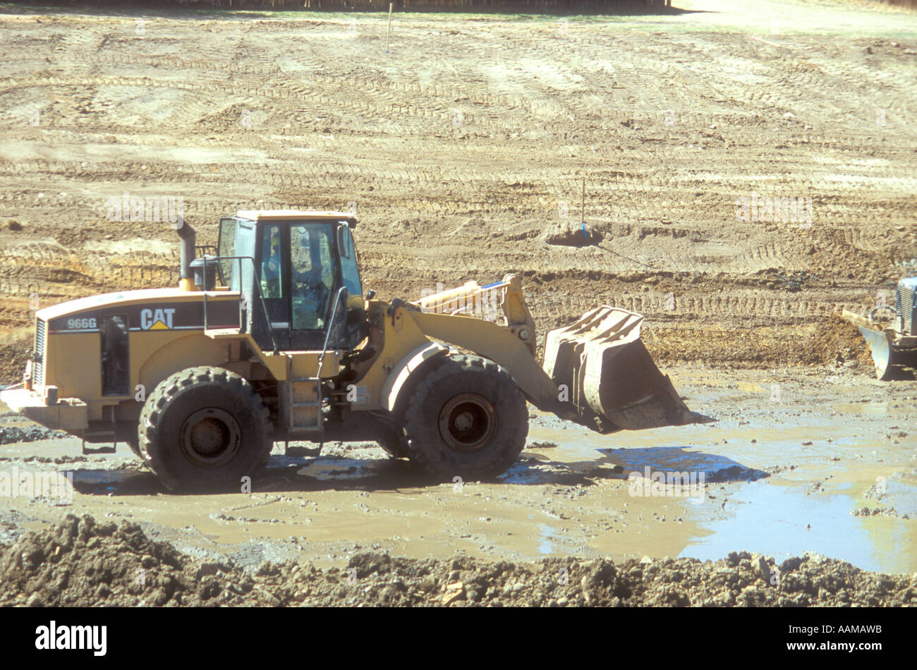 Wheel loader at construction site Stock Photo - Alamy