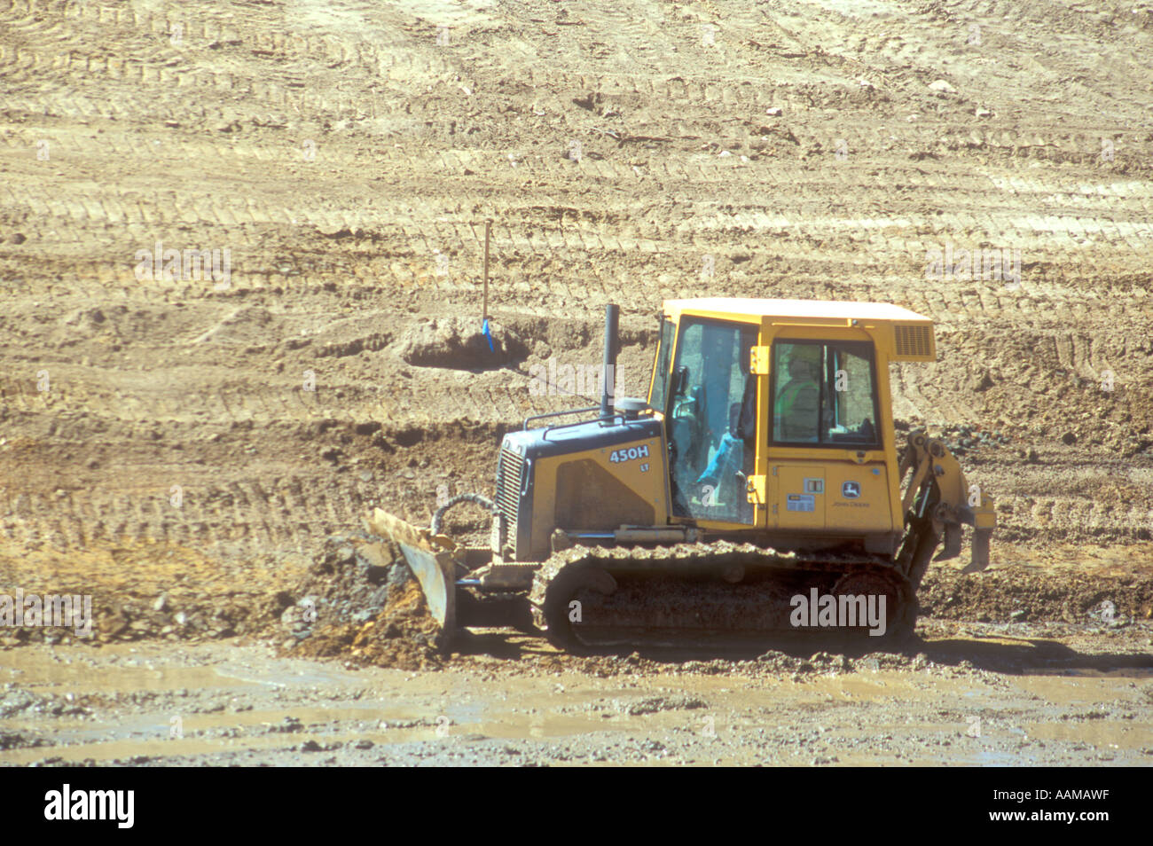 Track loader at construction site Stock Photo - Alamy