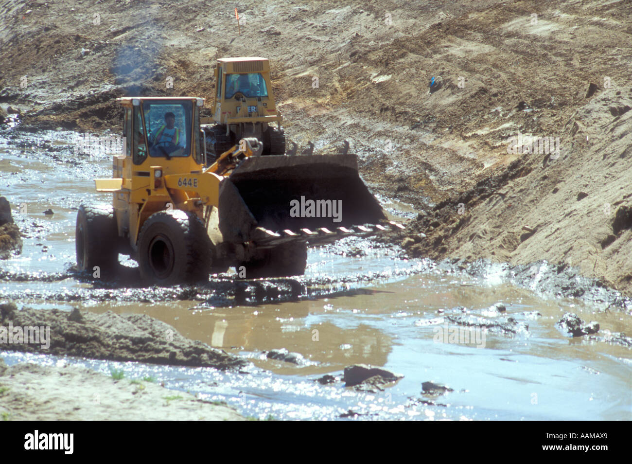 Wheel loader at construction site Stock Photo - Alamy