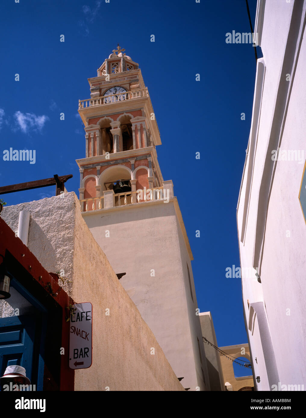 SANTORINI GREECE CHURCH CLOCK TOWER BY CAFE Stock Photo - Alamy