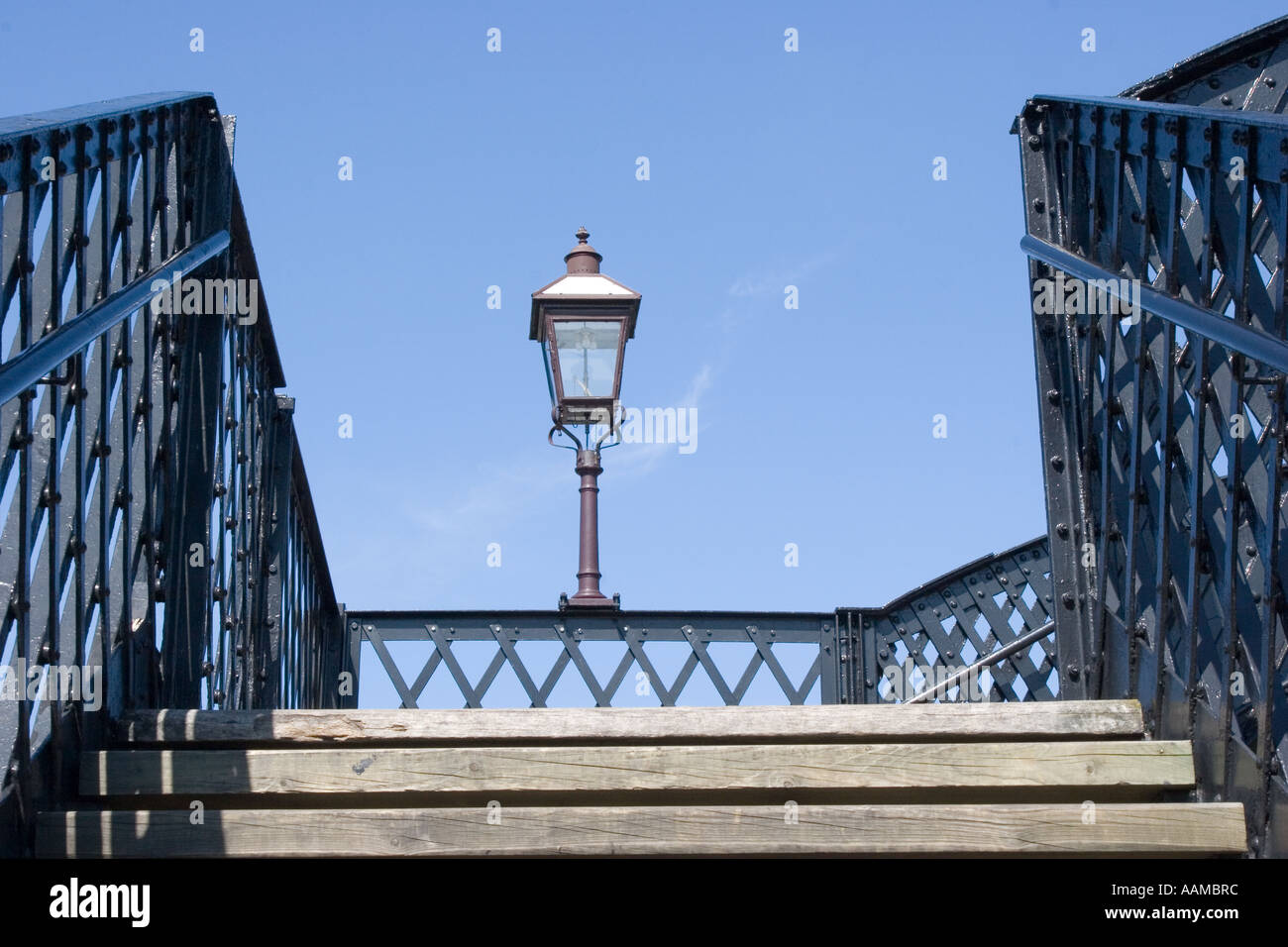 Lamp on railway footbridge Stock Photo - Alamy