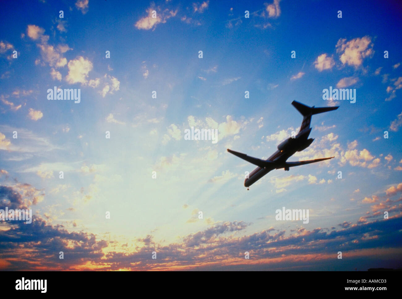 Plane clouds sunrays hi-res stock photography and images - Alamy