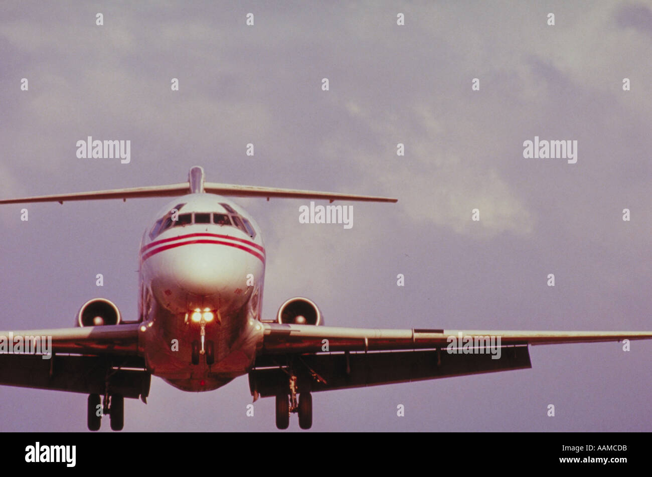 Front view of airplane taking off Stock Photo - Alamy
