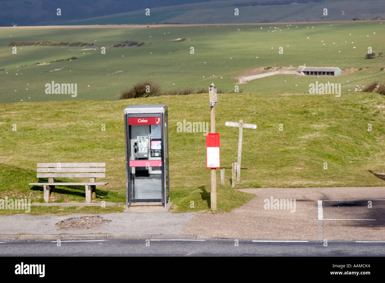 Isolated telephone box and bus stop on the East Sussex downs Stock ...