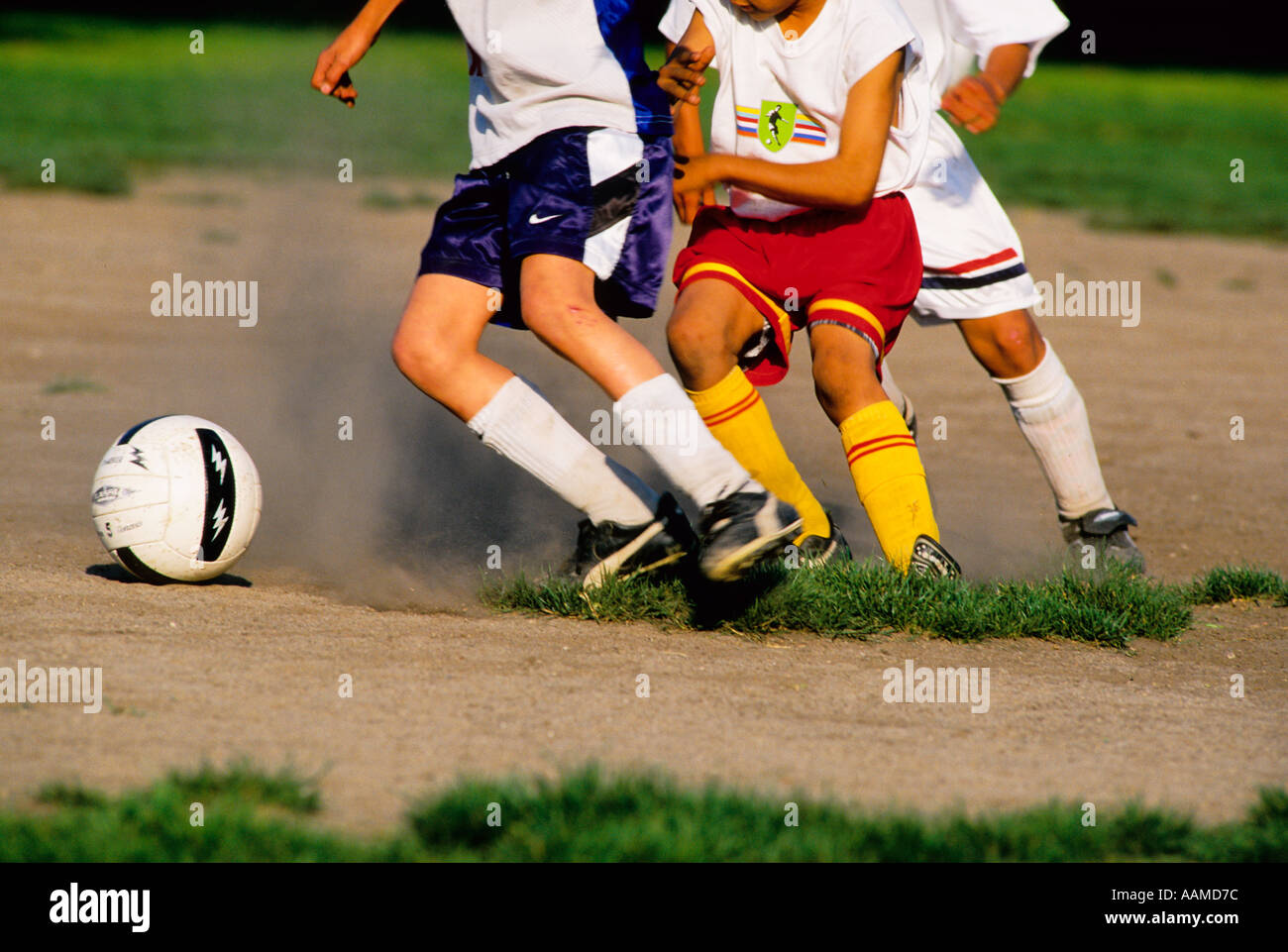detail of kids soccer player s legs football Stock Photo - Alamy