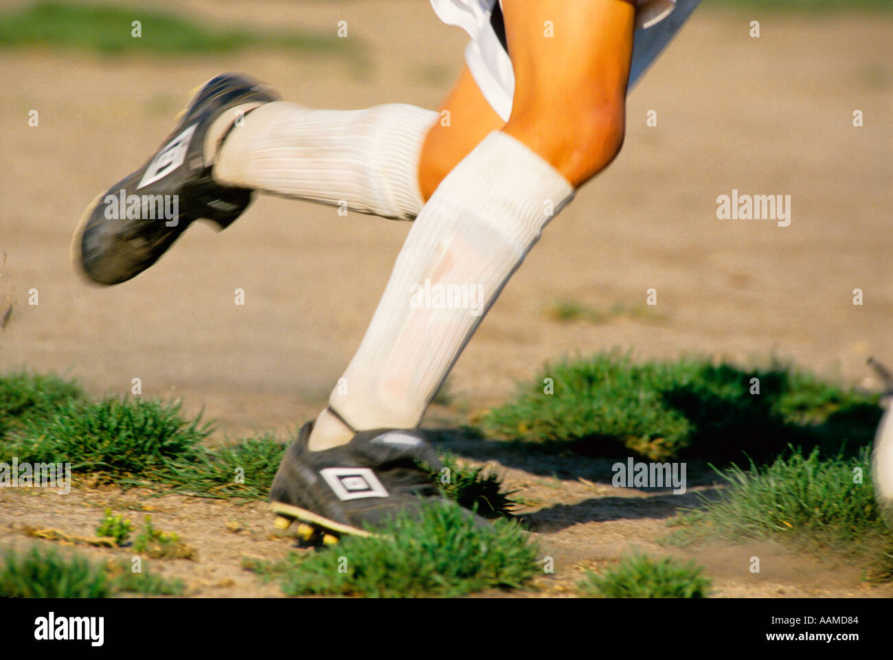 detail of kids soccer player s legs football Stock Photo - Alamy