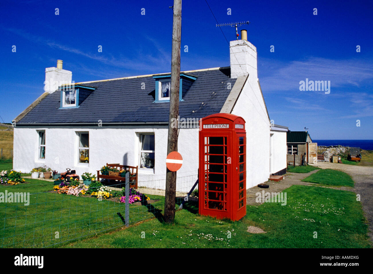 DURNESS SCOTLAND RED TELEPHONE BOOTH BY COTTAGE Stock Photo - Alamy