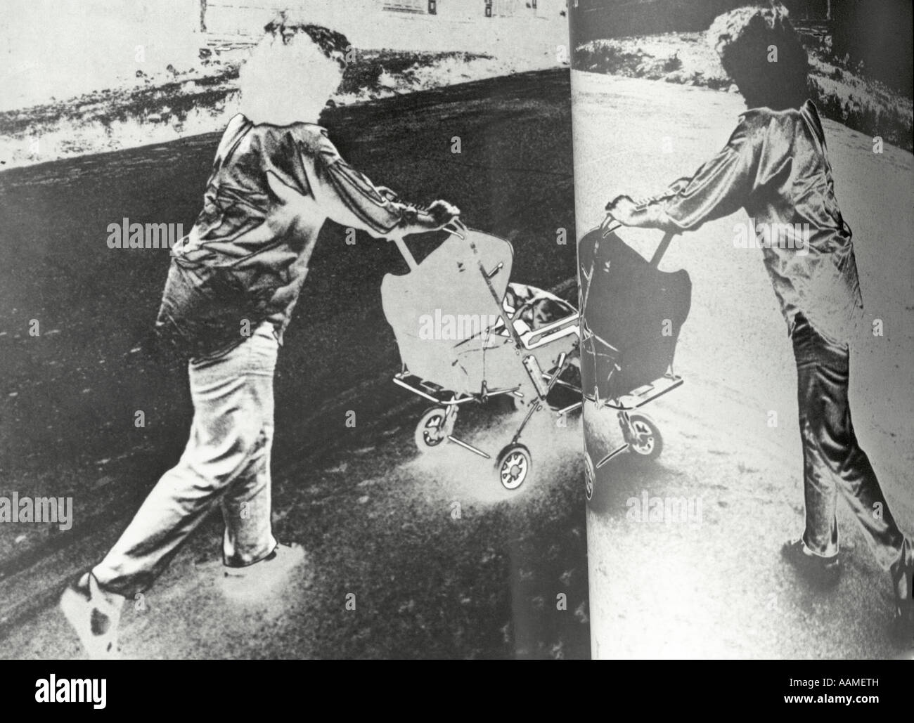 Woman pushing baby stroller with reverse image Stock Photo - Alamy