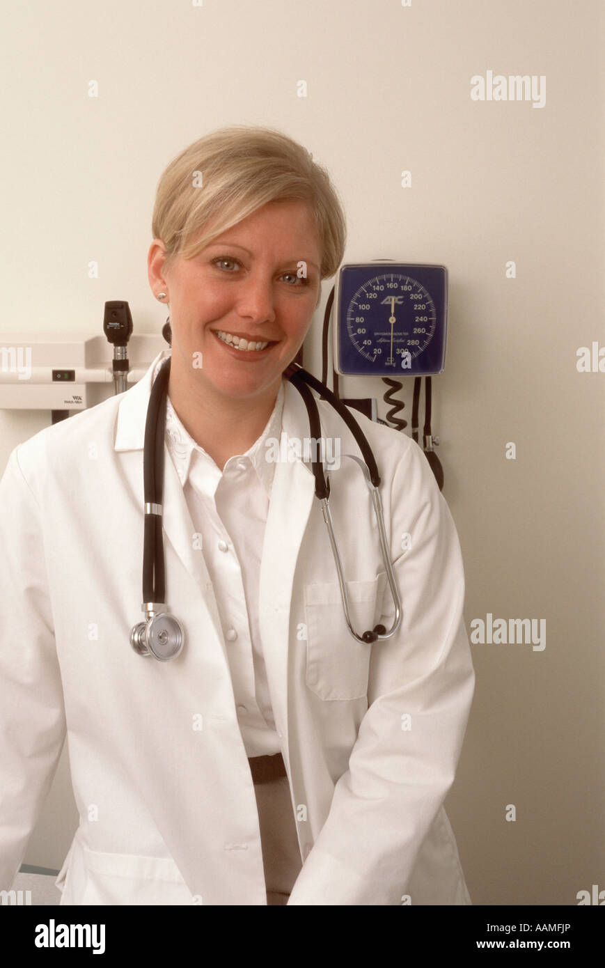 Portrait of medical professional in examination room Stock Photo - Alamy