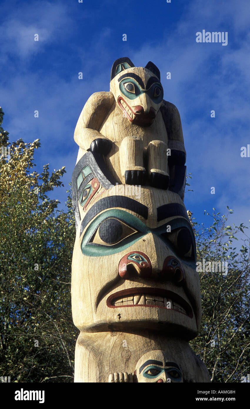KETCHIKAN ALASKA WOLF AND HUMAN TOTEM AT TOTEM BIGHT STATE PARK Stock ...