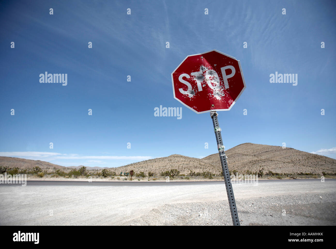 Stop sign dents from bullets hi-res stock photography and images - Alamy