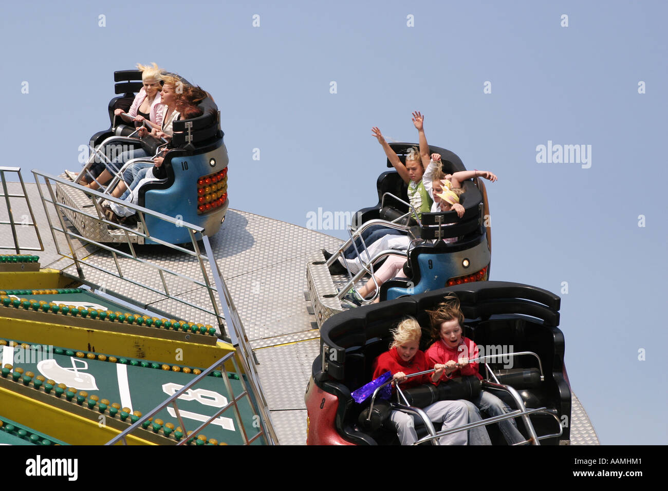 Tivoli ride in a fast spinning attraction Stock Photo - Alamy