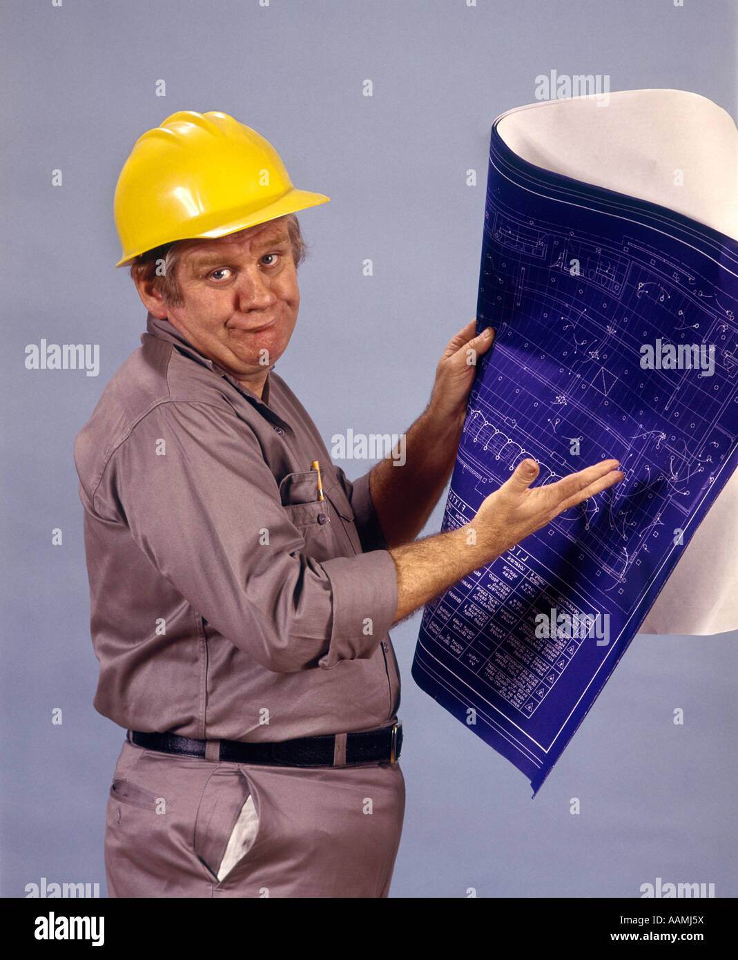 MAN WORKER CONSTRUCTION HARD HAT BLUEPRINTS CONFUSION CONFUSED 1970 ...