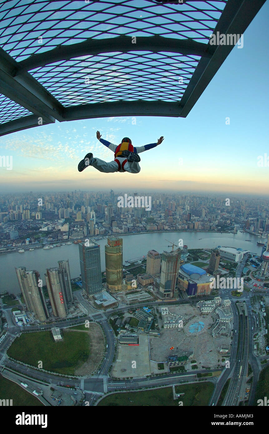 Base jumper jin mao tower extreme sport hi-res stock photography and ...