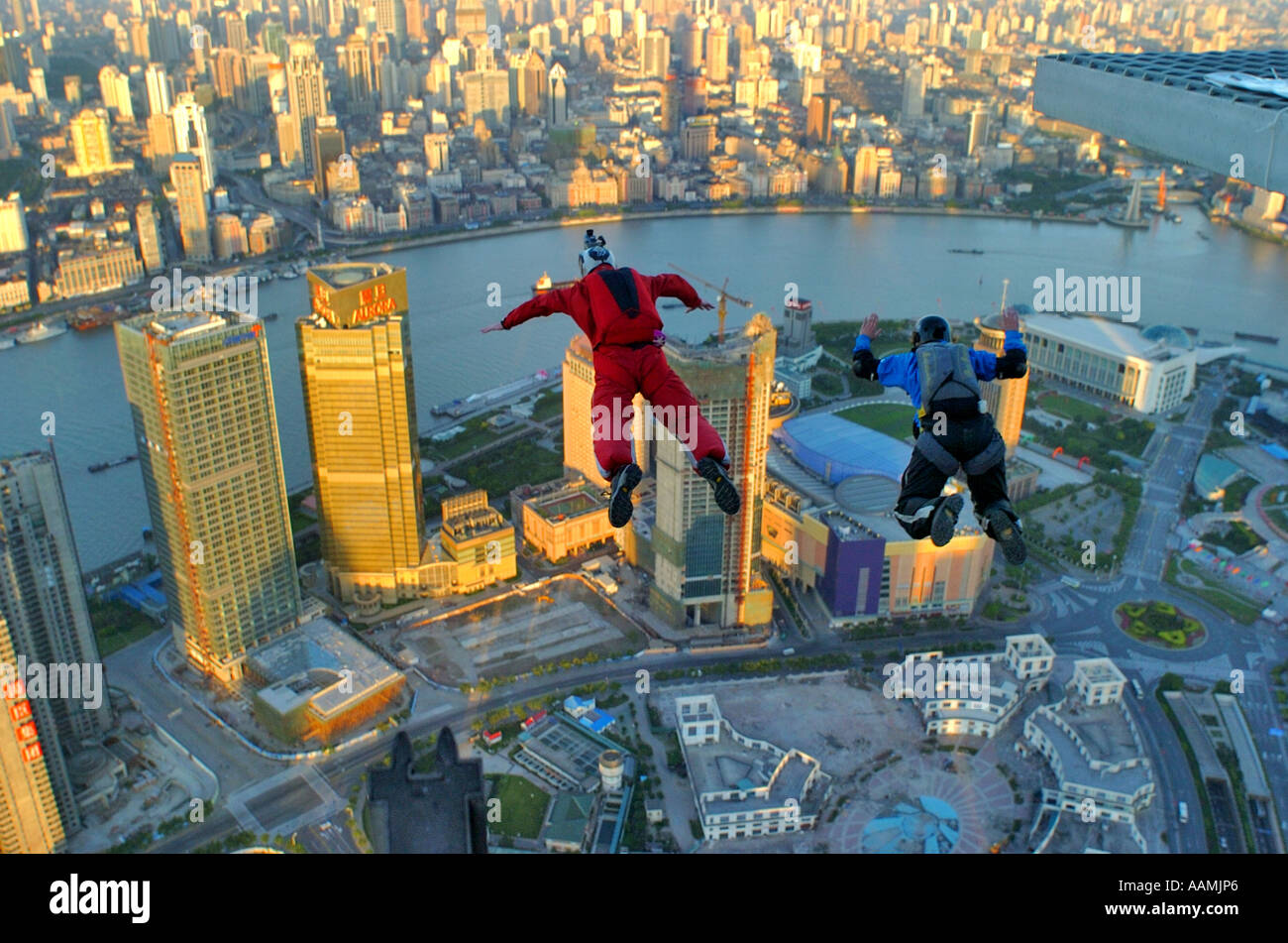 BASE Jump in Shanghai at sunrise Stock Photo - Alamy