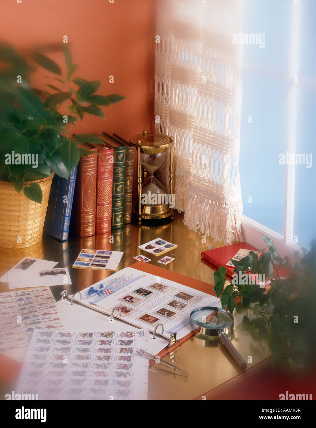 STAMP COLLECTION MATERIALS ON DESK Stock Photo - Alamy