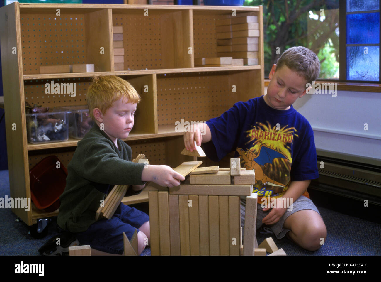 TWO BOYS PLAYING WITH BLOCKS IN PRESCHOOL CLASSROOM Stock Photo - Alamy