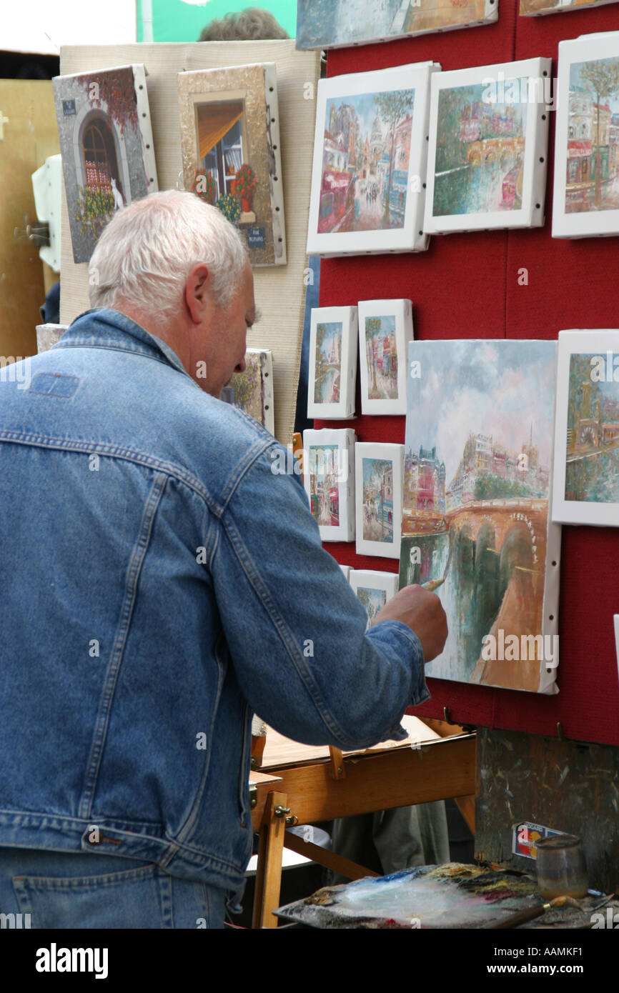 Artist at work in the artists quarter Montmartre Paris France Europe ...