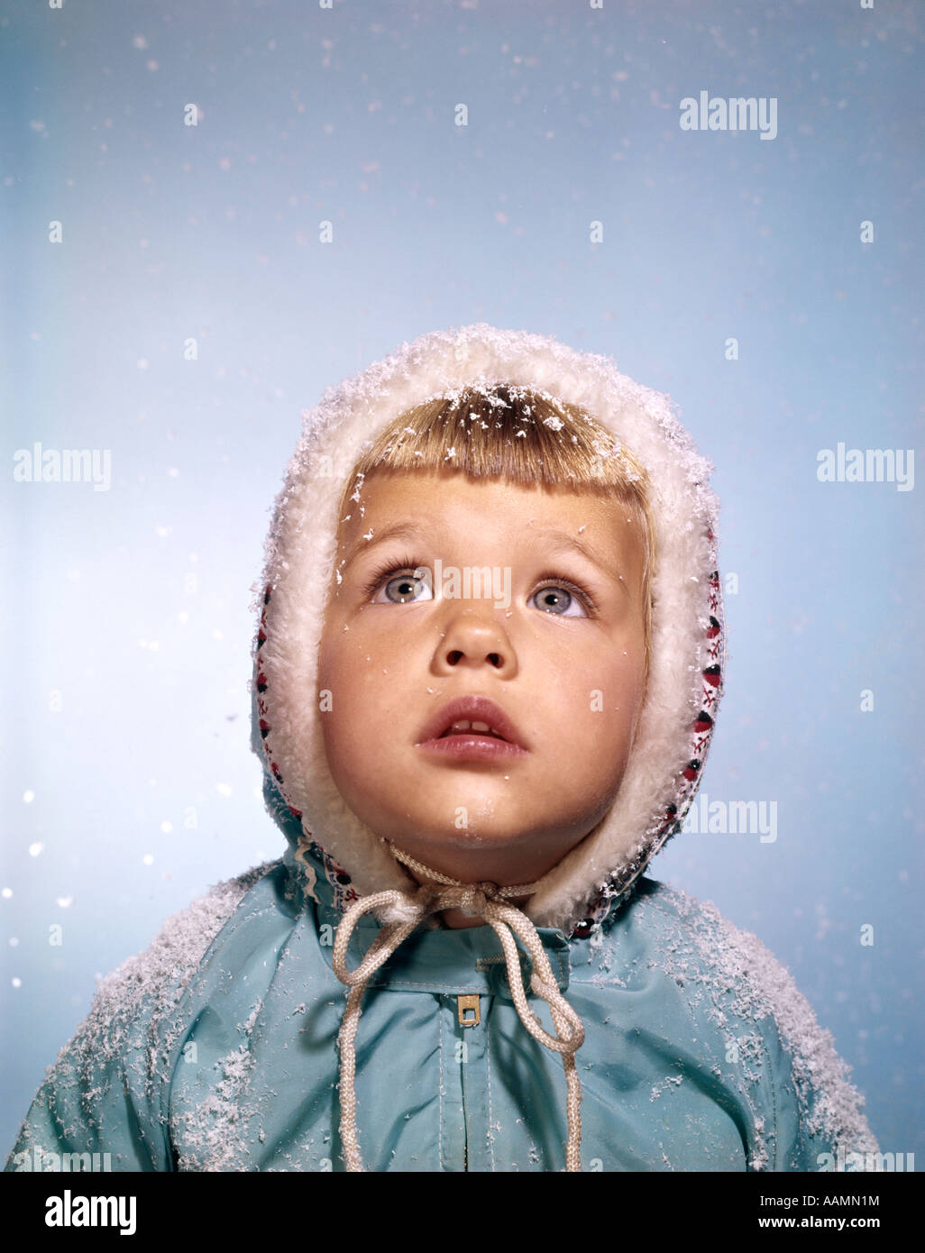 Child looking cold 1960s hi-res stock photography and images - Alamy