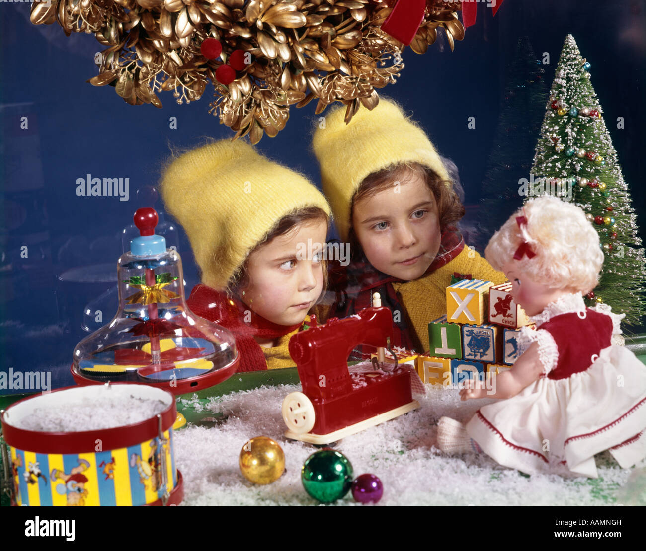 1960s TWIN SISTERS LOOKING AT TOY DISPLAY IN STORE WINDOW NOSTALGIA TWO ...