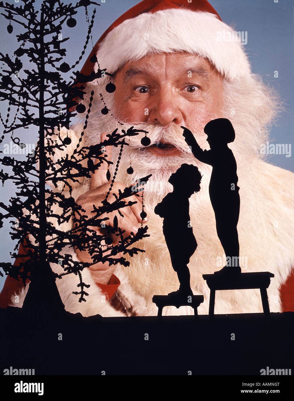 ANONYMOUS SILHOUETTED LITTLE BOY AND GIRL LOOKING UP AT CHRISTMAS TREE ...