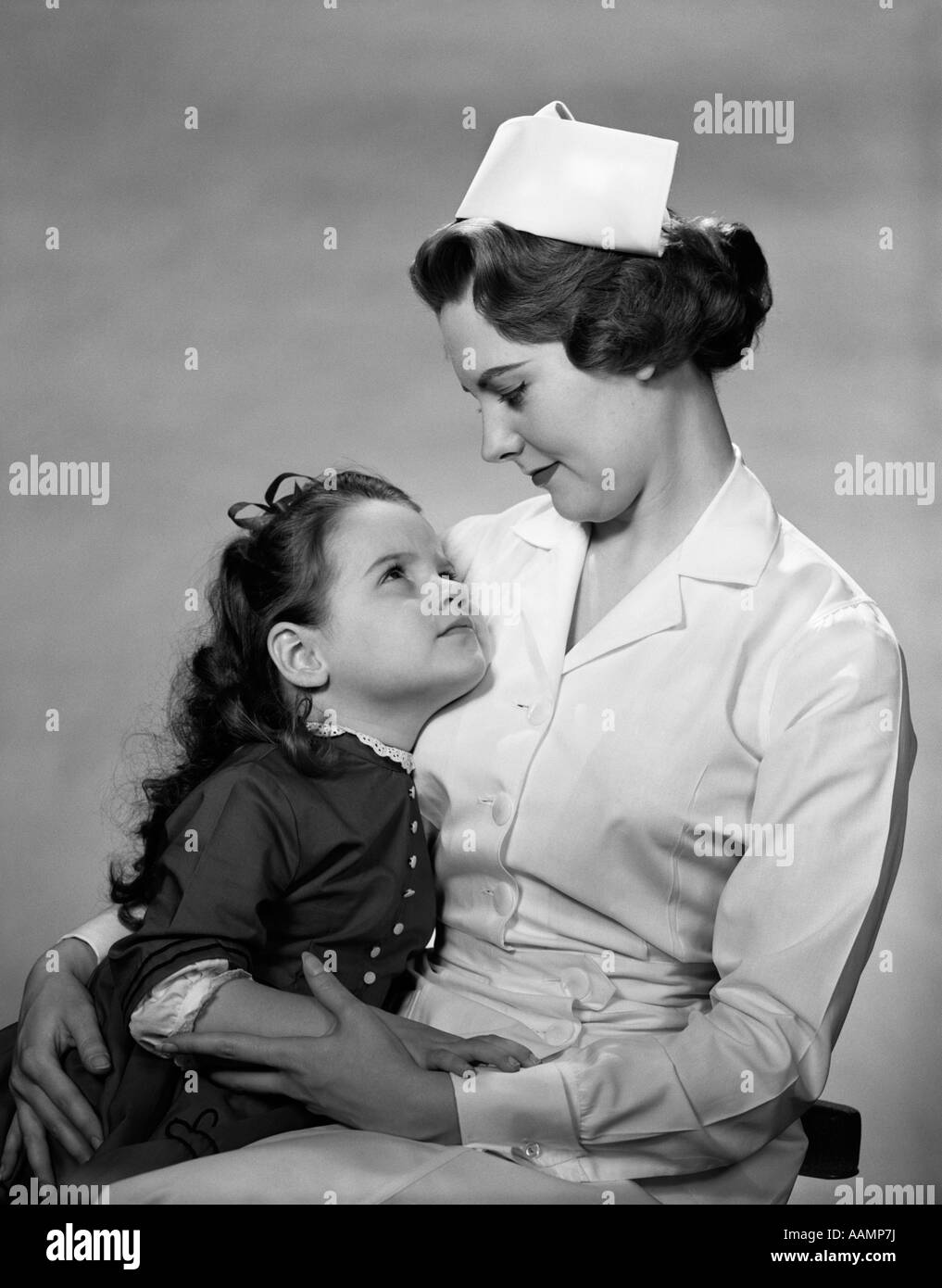 1950s NURSE GIRL PATIENT CONSOLE HUG EMBRACE Stock Photo - Alamy