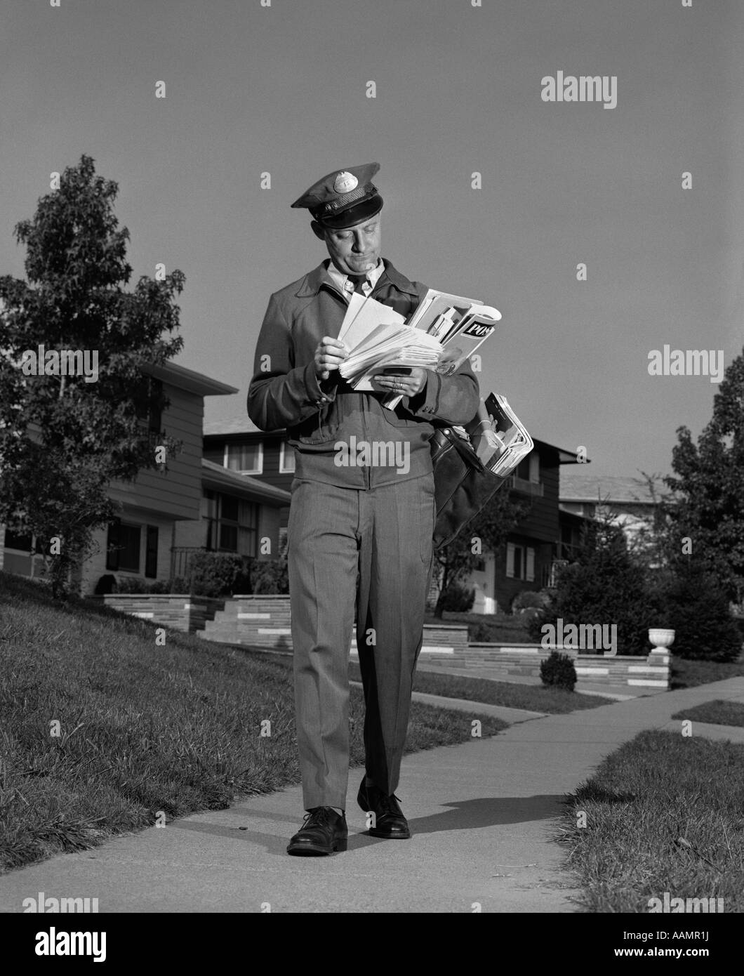 Postman delivering letter vintage High Resolution Stock Photography and ...