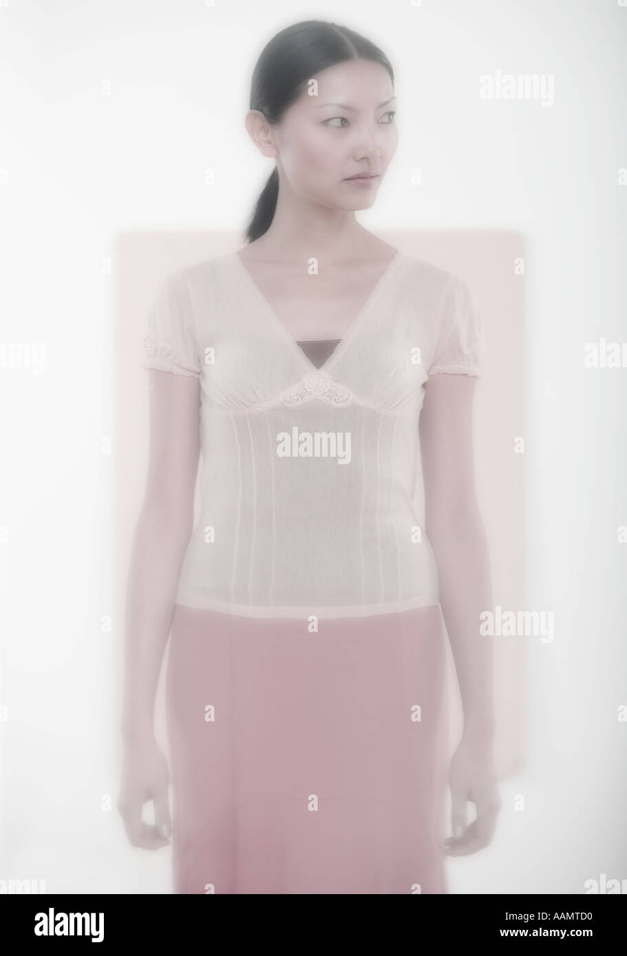 Portrait woman facing sideways hi-res stock photography and images - Alamy