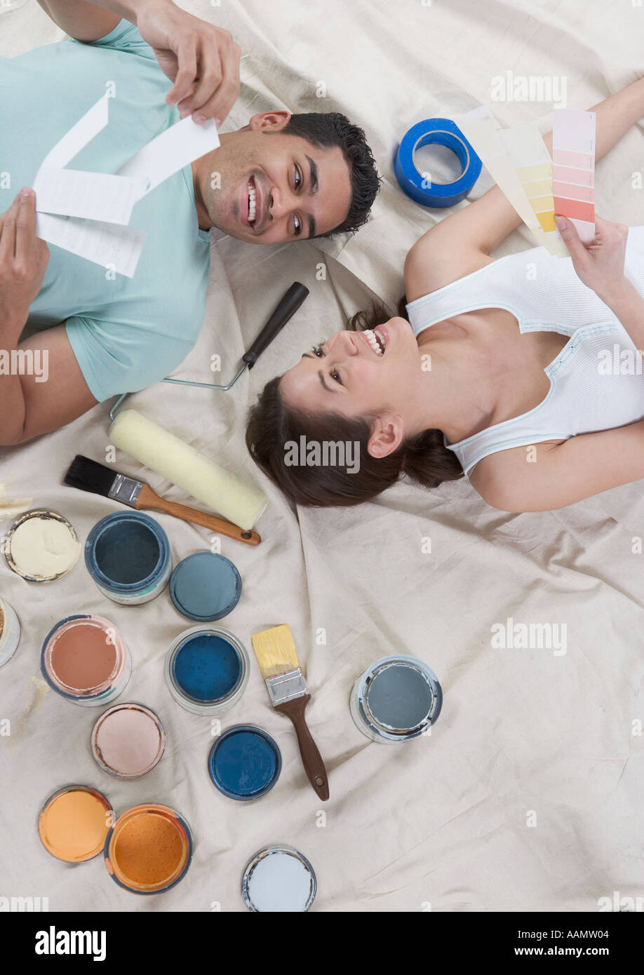 Couple picking out paint colors Stock Photo - Alamy