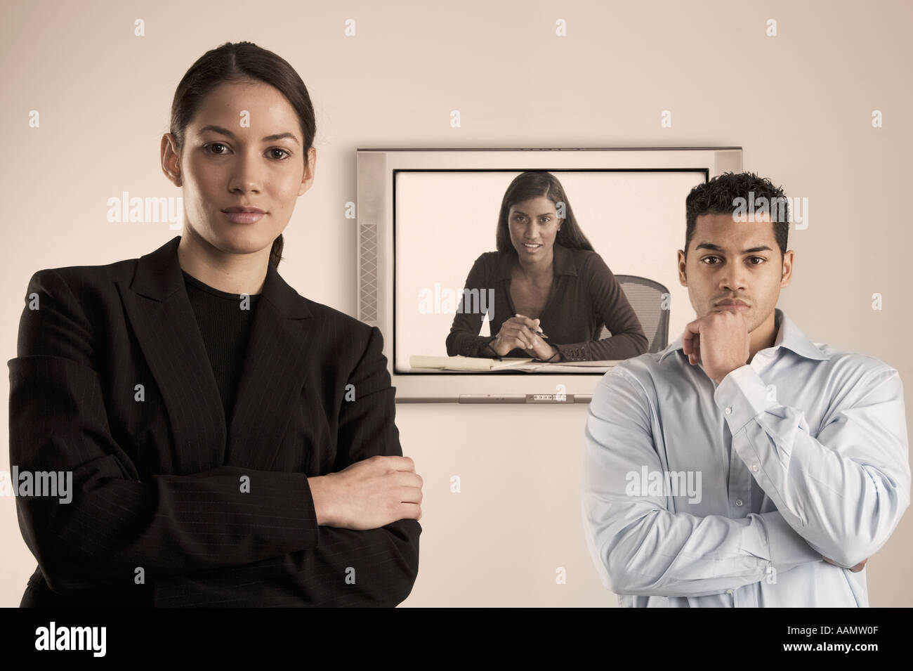 Portrait of business people in front of monitor Stock Photo - Alamy
