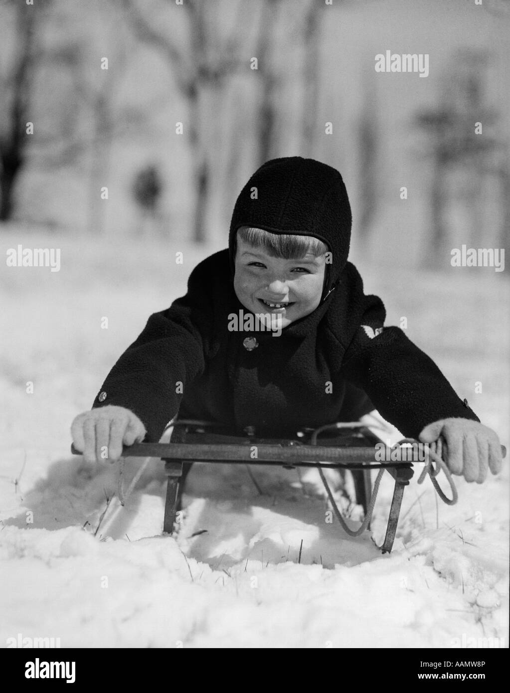 Vintage boys in the snow Black and White Stock Photos & Images - Alamy
