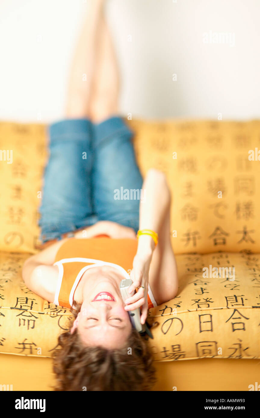 Woman upside down on couch one person hi-res stock photography and ...