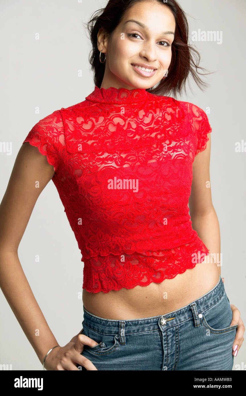 Portrait of woman in red shirt Stock Photo - Alamy
