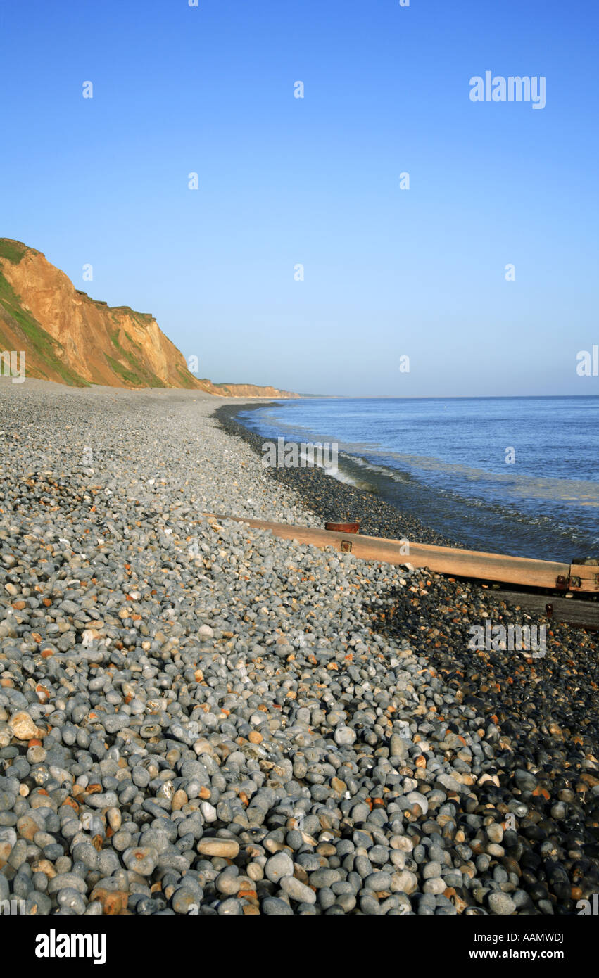 A view along the beach with cliffs and shoreline westwards towards ...