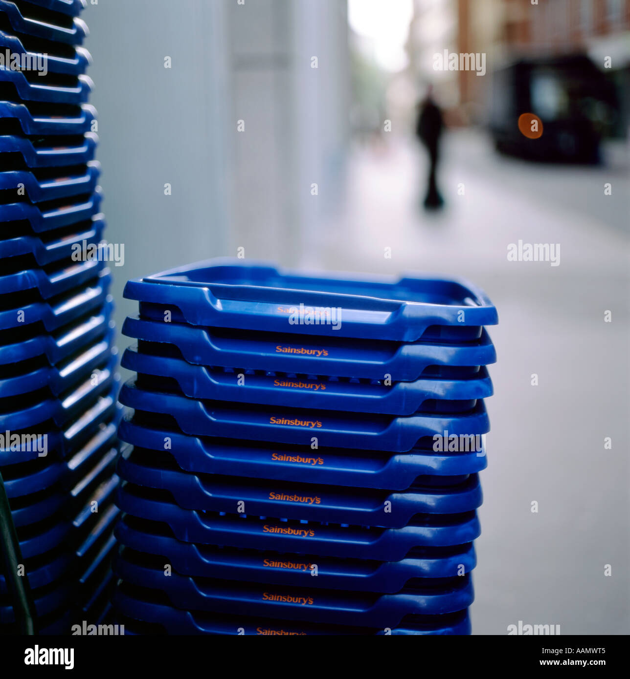 Stack of baskets in supermarket High Resolution Stock Photography and ...