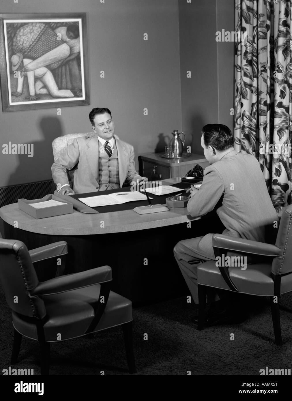 Two people meeting discussing Black and White Stock Photos & Images - Alamy