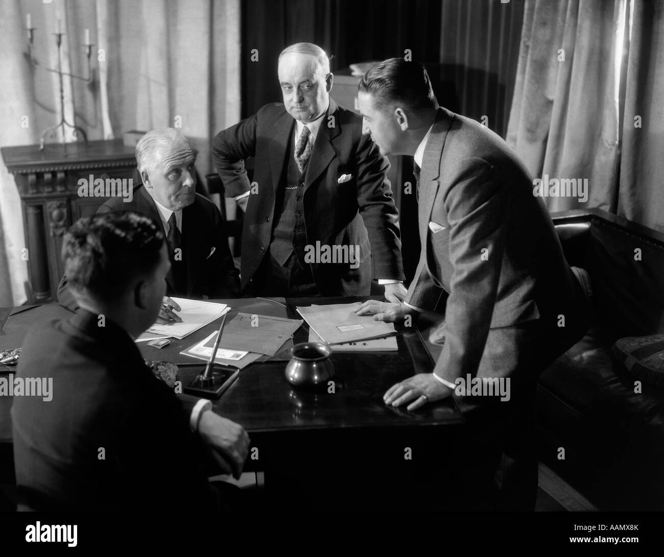 1930s RETRO MEN DESK MEETING SUITS BUSINESS Stock Photo - Alamy