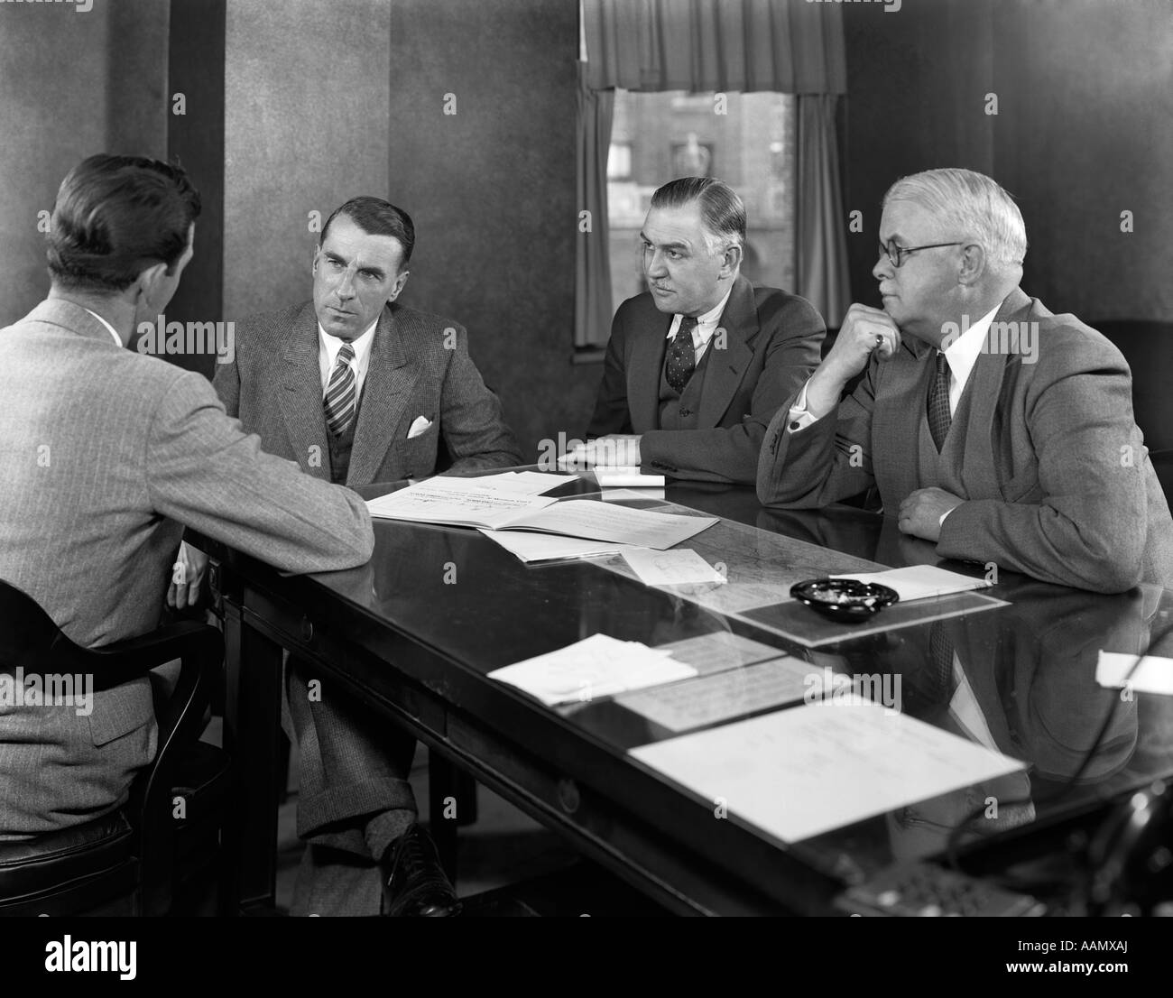 1930s 1940s men talking sitting hi-res stock photography and images - Alamy