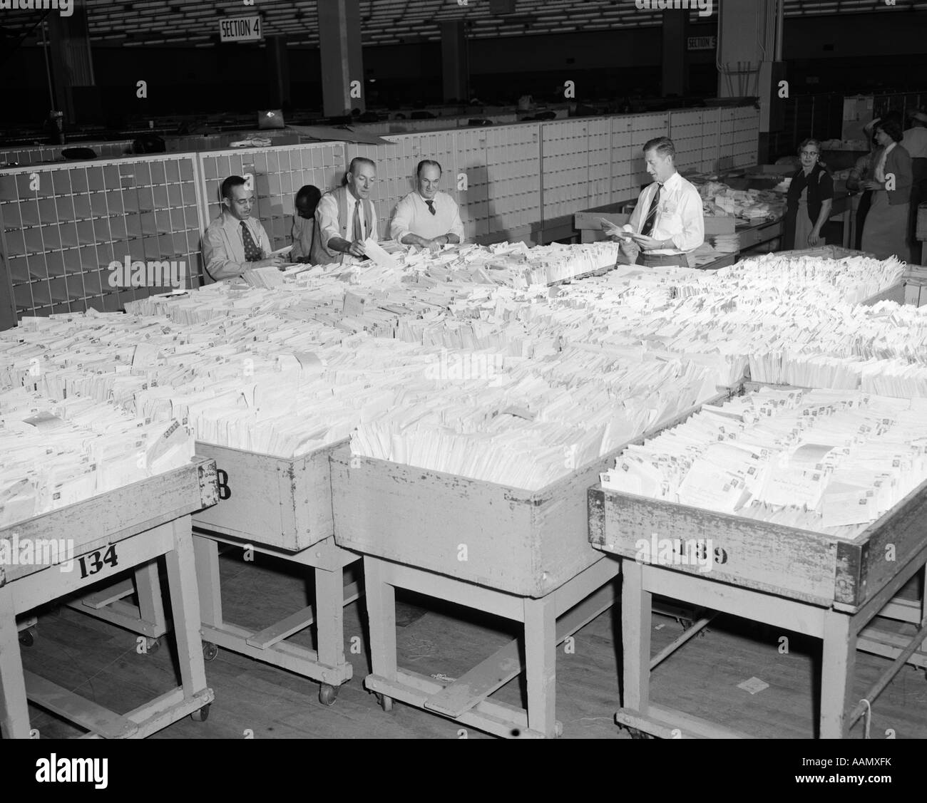 Person sorting Black and White Stock Photos & Images - Alamy