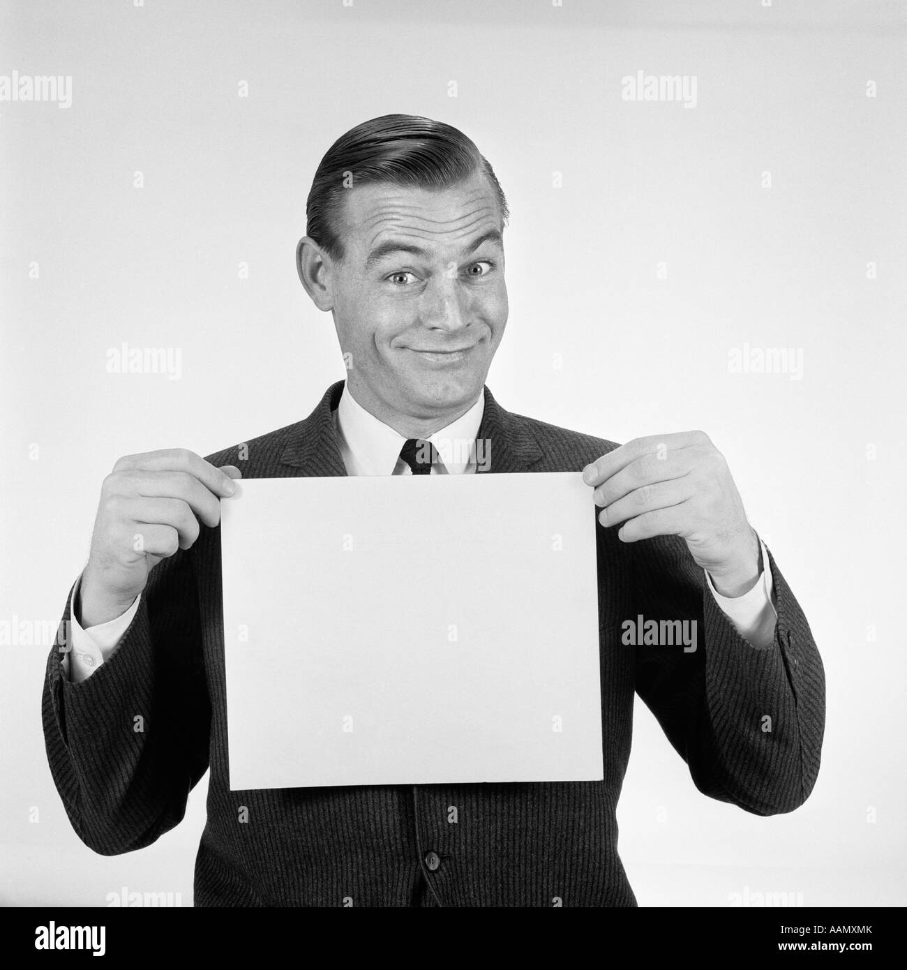 Man holding up sign, 1950s hi-res stock photography and images - Alamy